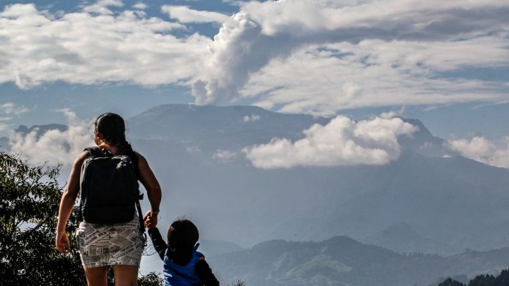 As Colombian volcano rumbles to life, villagers resist evacuation ...